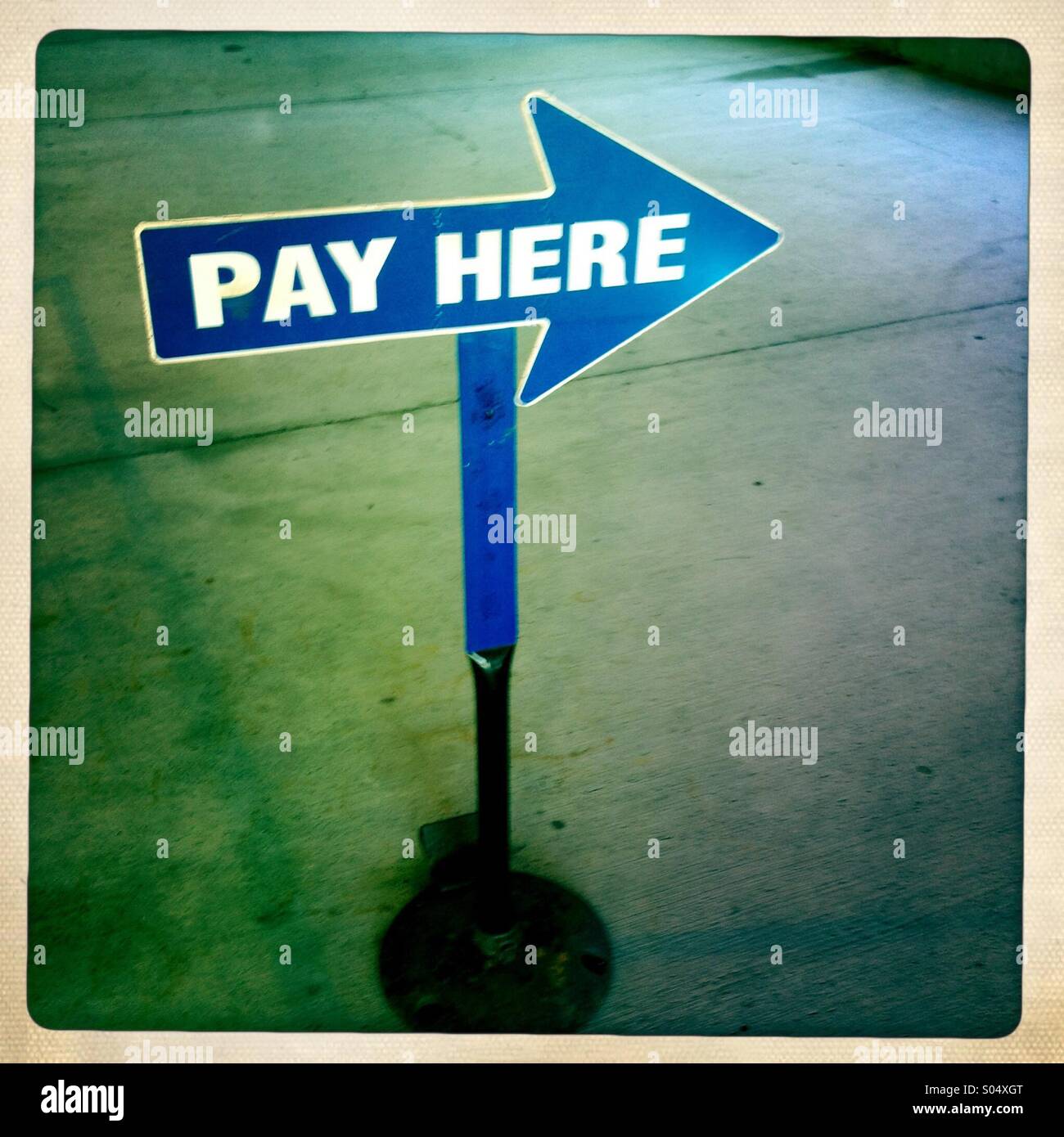 Pay Here Sign Stock Photo - Alamy