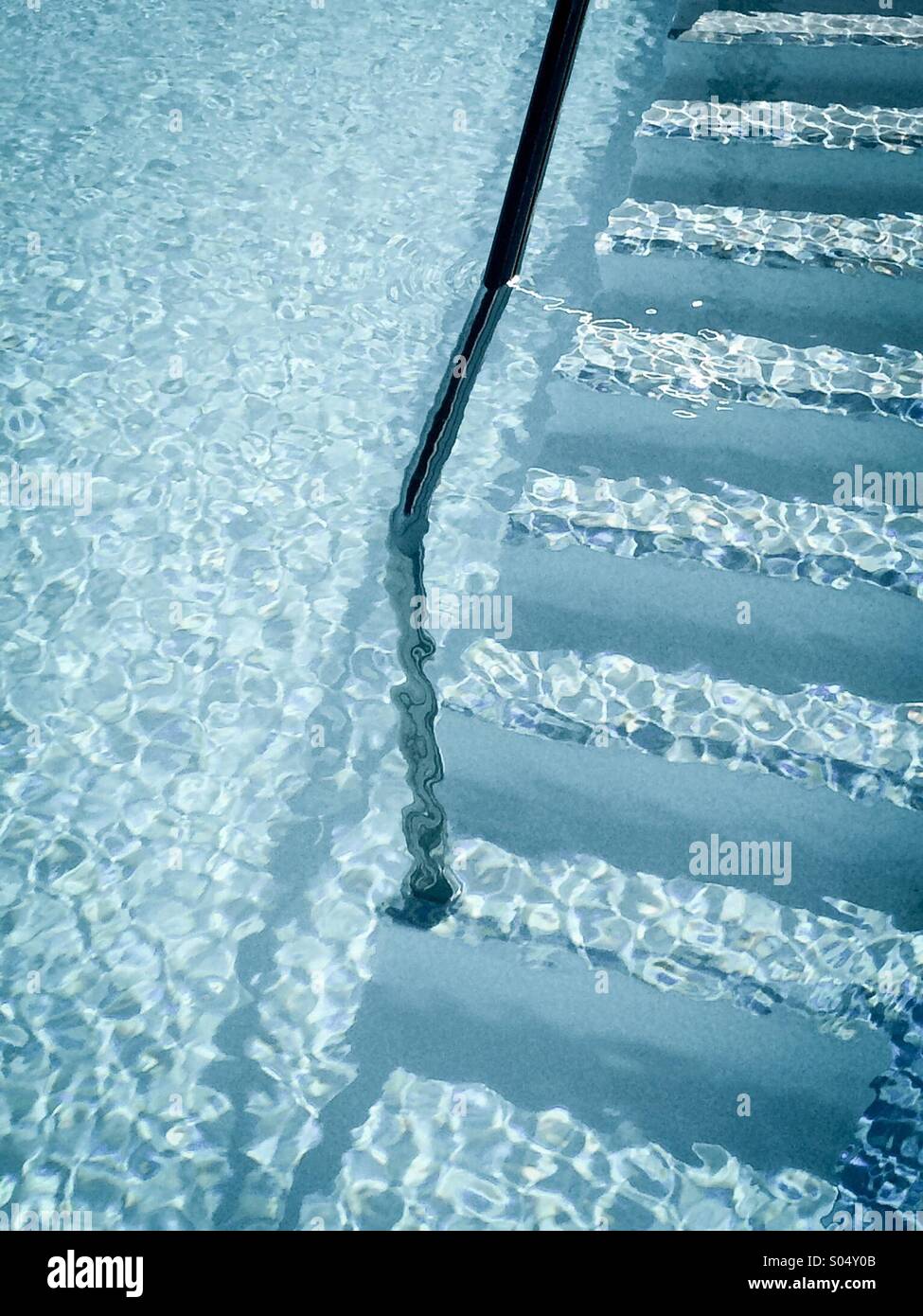 Steps leading into swimming pool Stock Photo - Alamy