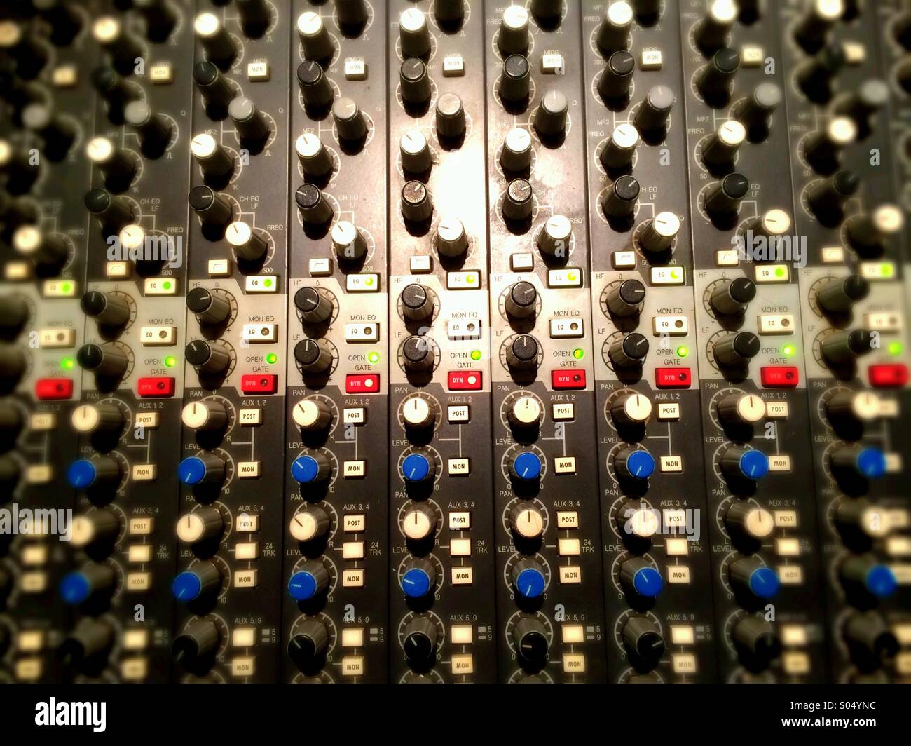 Mixing desk buttons in a pattern Stock Photo - Alamy