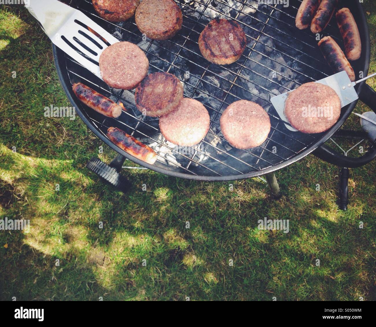 Flipping burgers hi-res stock photography and images - Alamy