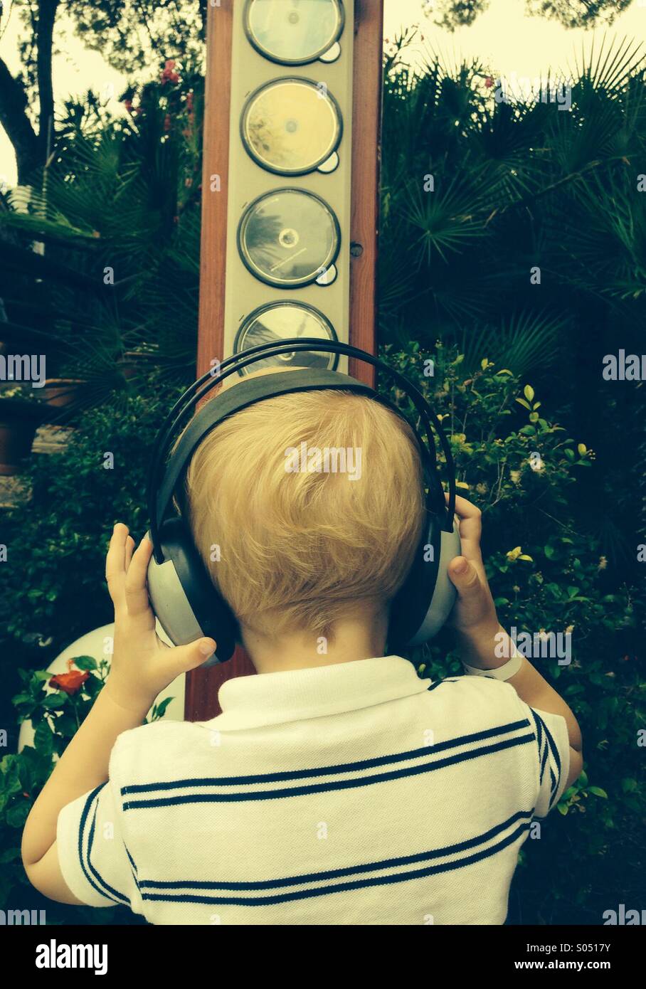 Boy listen to music hi-res stock photography and images - Alamy