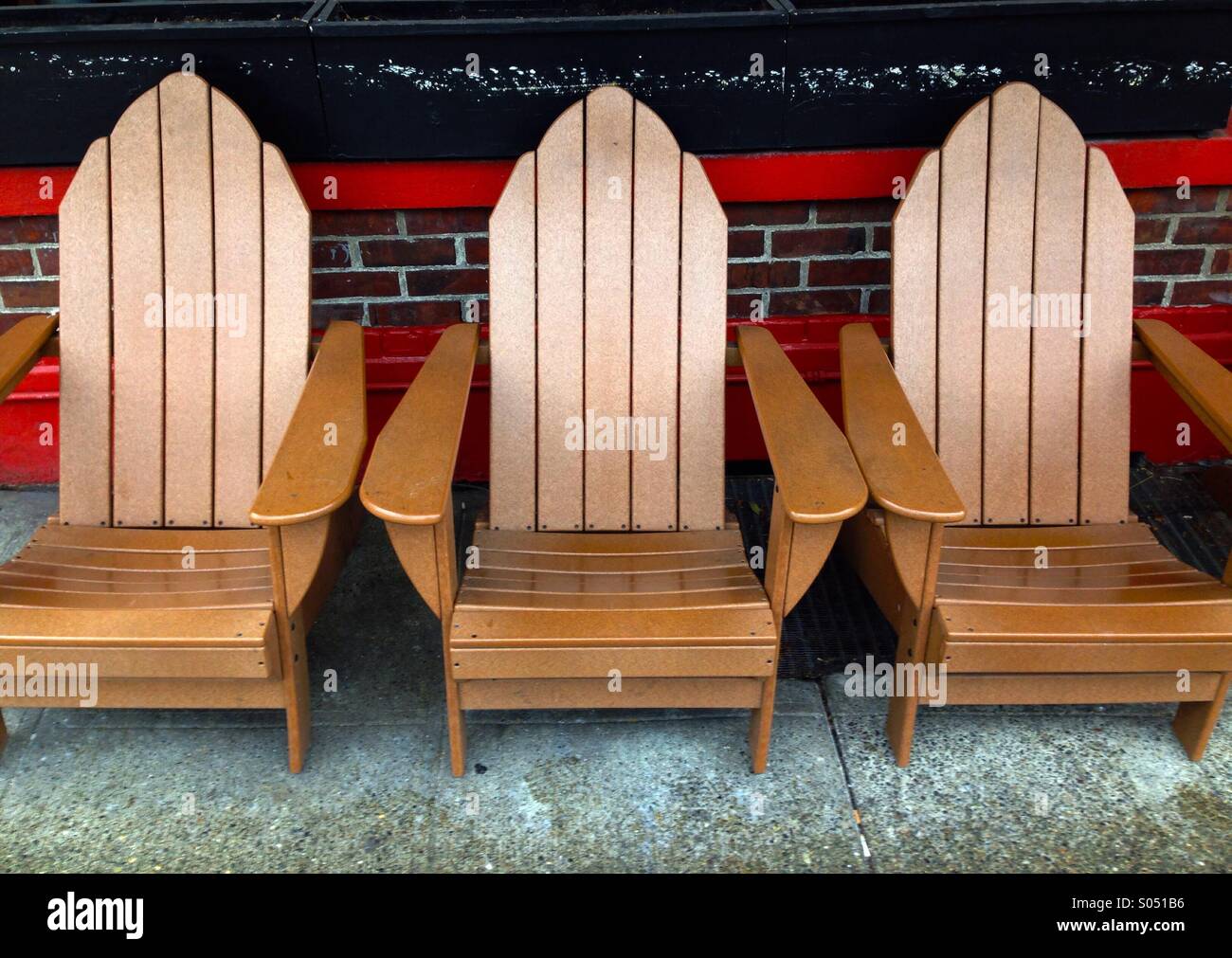 Three wooden chairs Stock Photo - Alamy