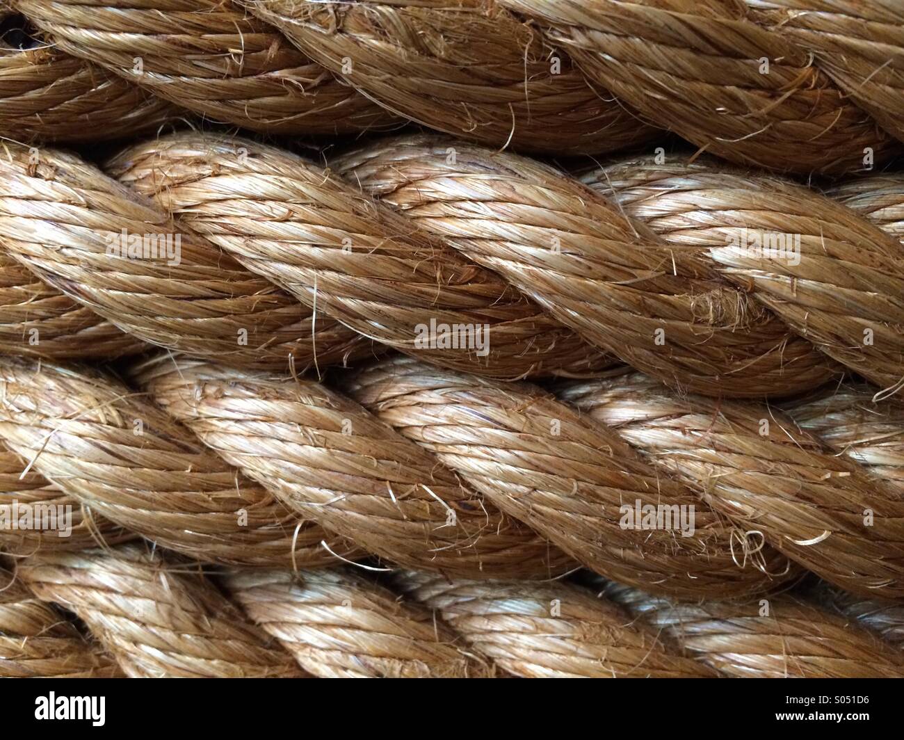 Wrapped up rope Stock Photo - Alamy