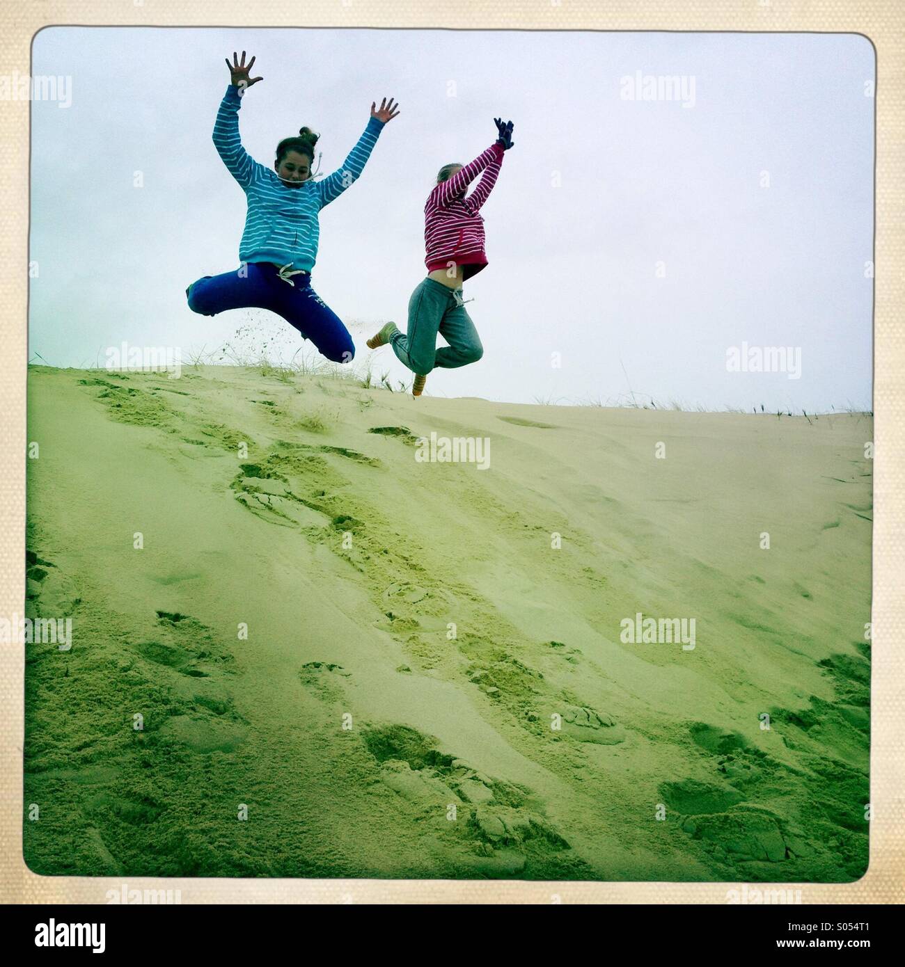 Kids jumping fun hi-res stock photography and images - Alamy