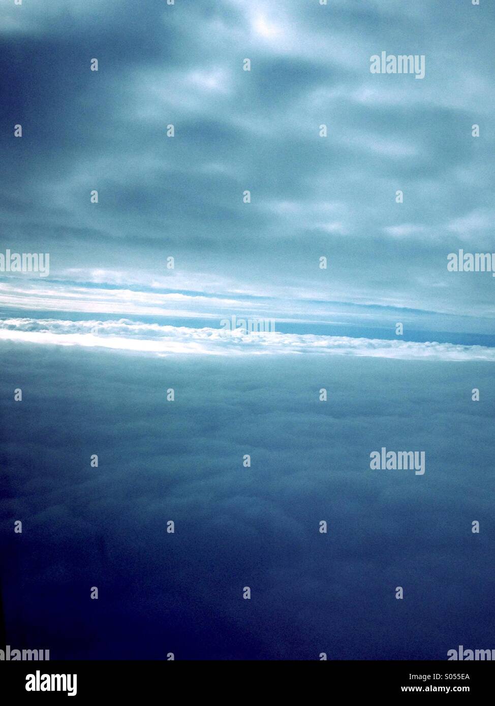 Into the clouds,view from a plane Stock Photo - Alamy