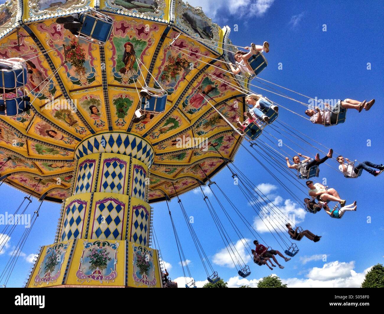 Fun at the Fairground! A Swing Carousel or Chair-o-Plane featuring ...