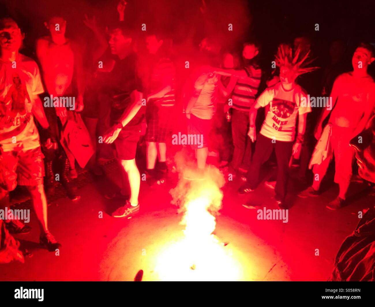 Fire flare at the rock band concert Stock Photo - Alamy