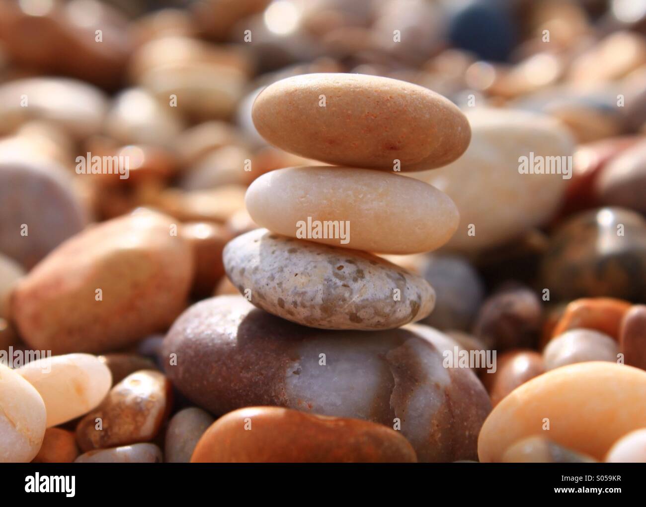 Pebble stone tower at the beach hi-res stock photography and images - Alamy