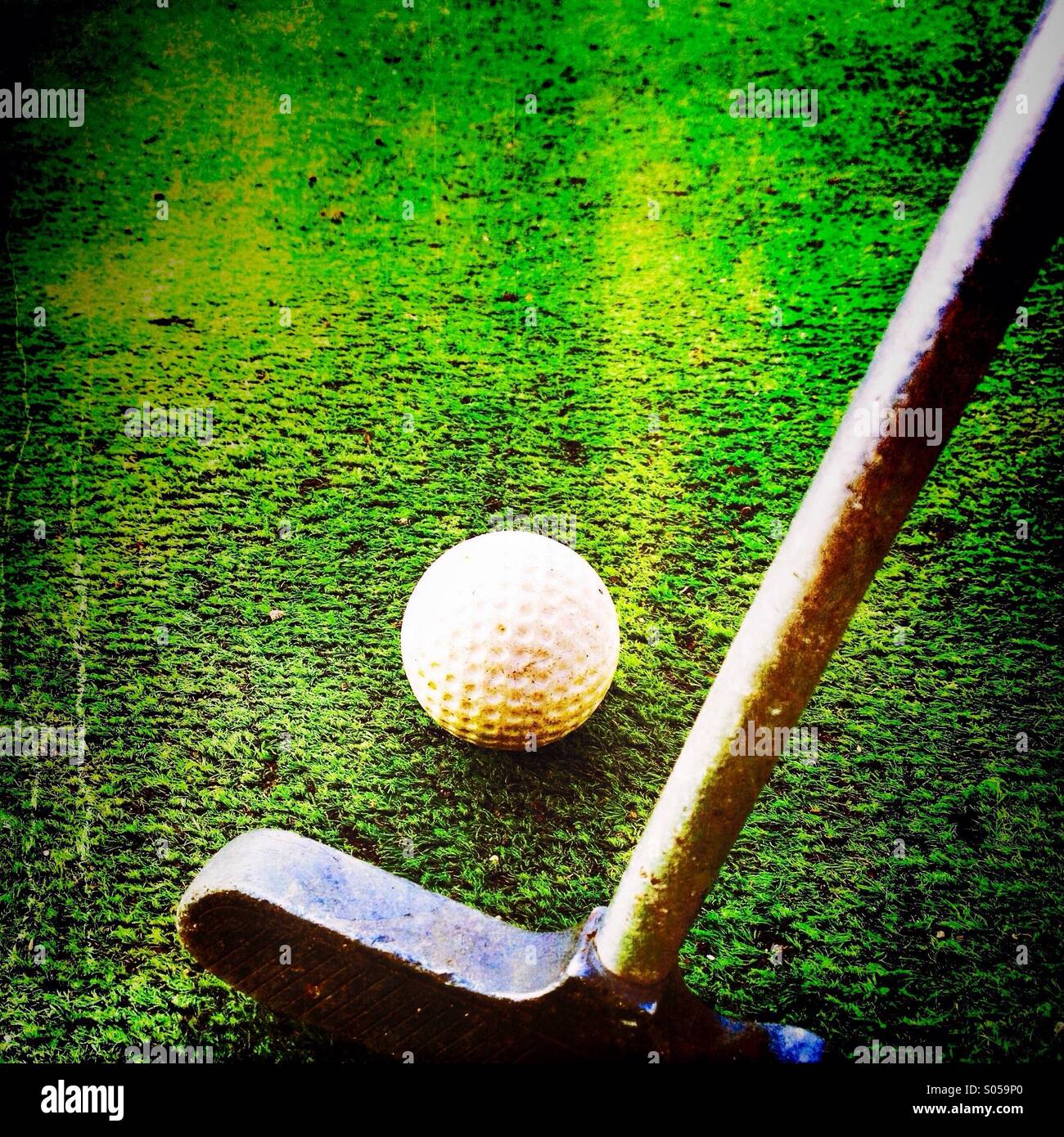 Putter and golf ball Stock Photo - Alamy