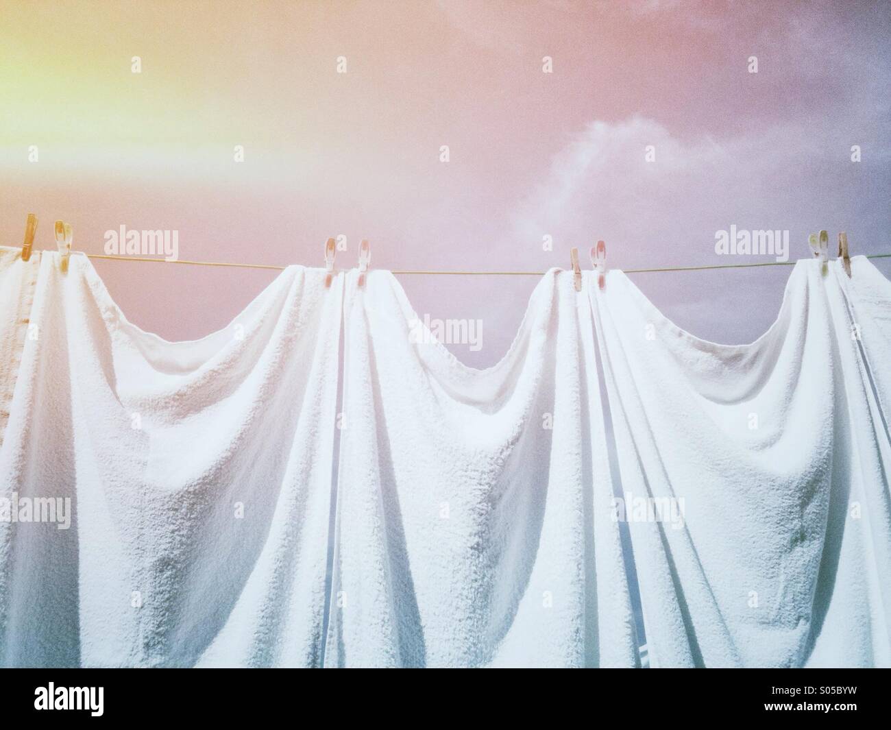 Drying washing on a line Stock Photo - Alamy