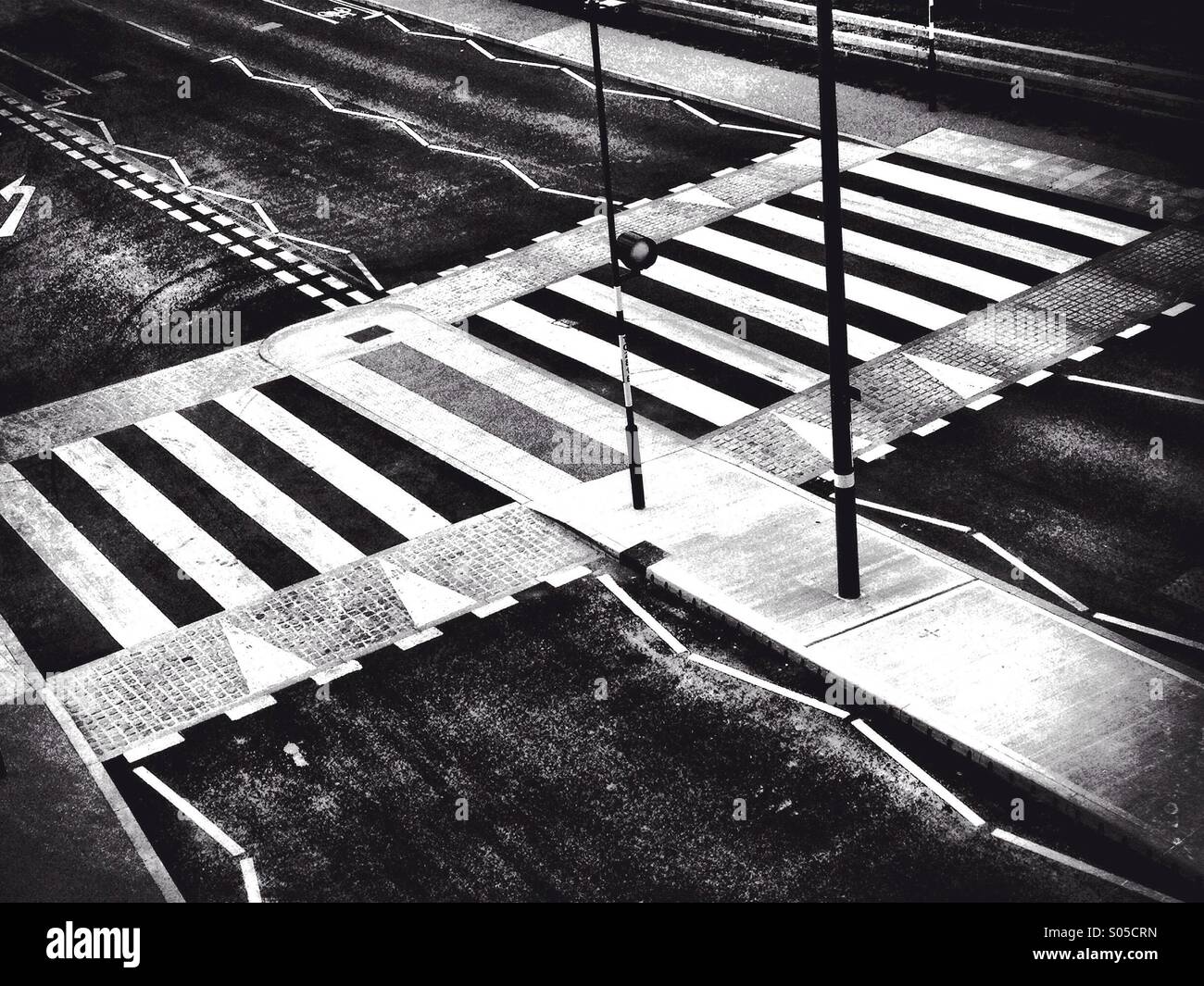 Zebra Crossing on a wide empty road. Black and white photograph Stock ...