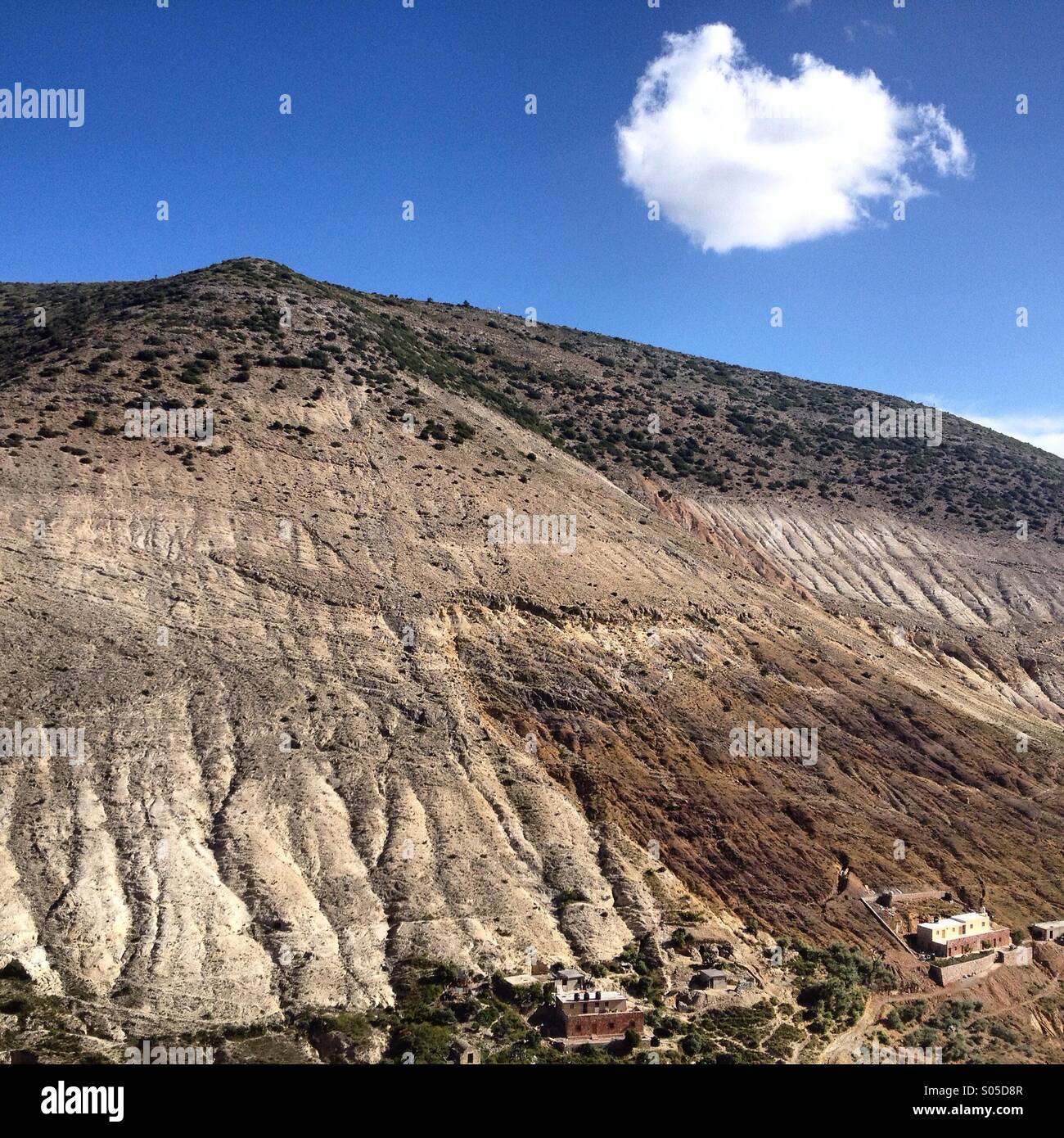 A white cloud over desert mountains in Real de Catorce, San Luis Potosi ...