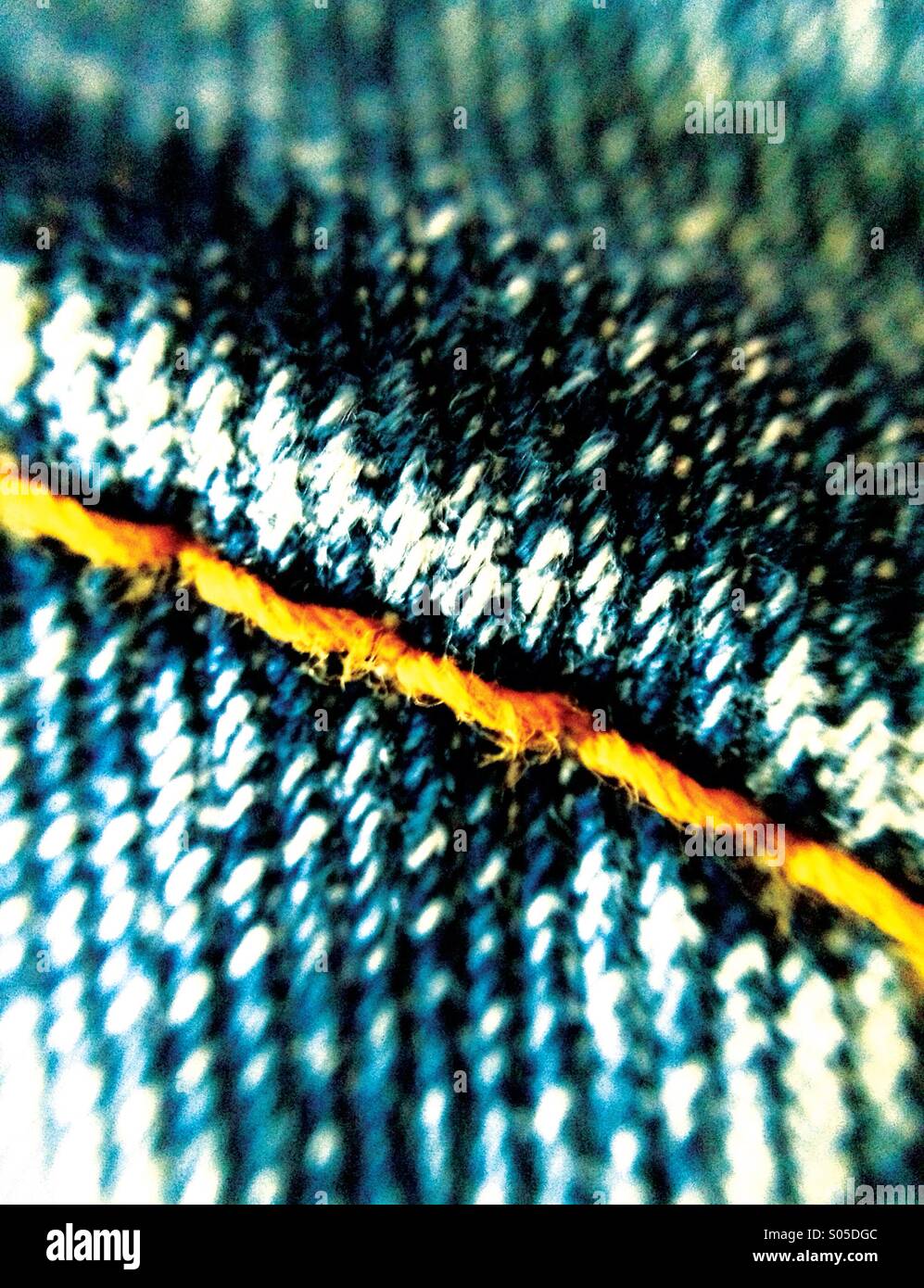 Stitching on jeans Stock Photo - Alamy