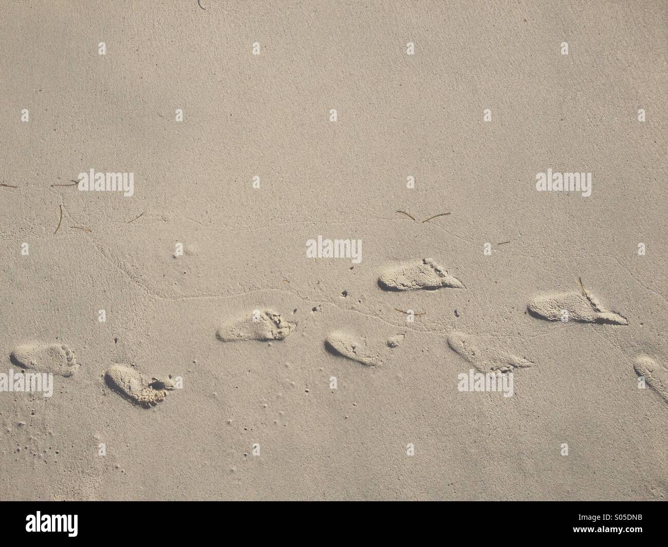 Childs footprints hi-res stock photography and images - Alamy