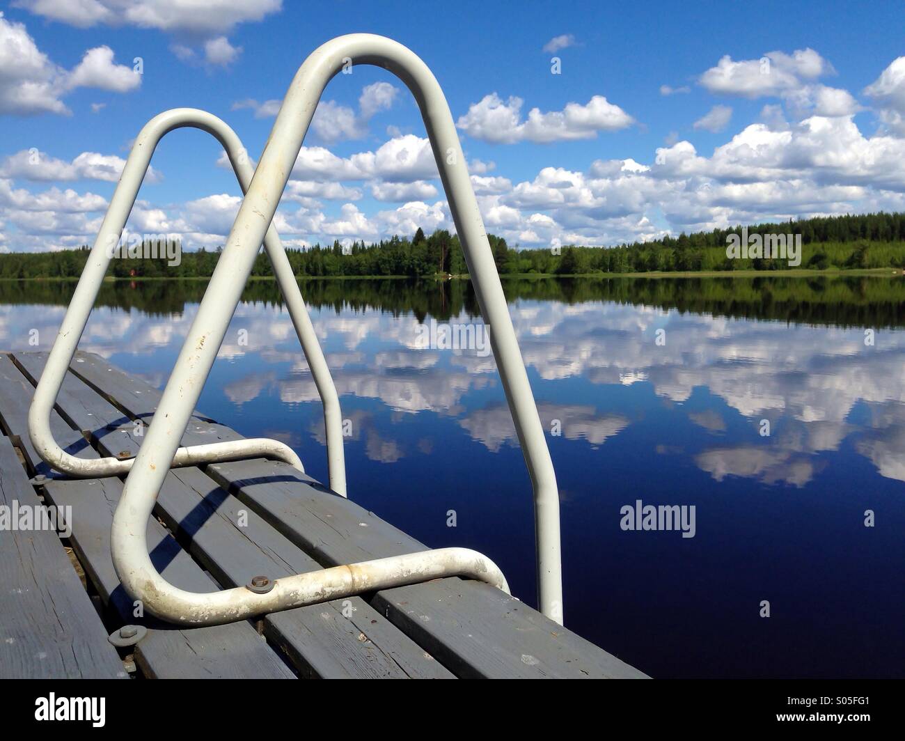 Swimming ladder and summer lake scenery Stock Photo - Alamy