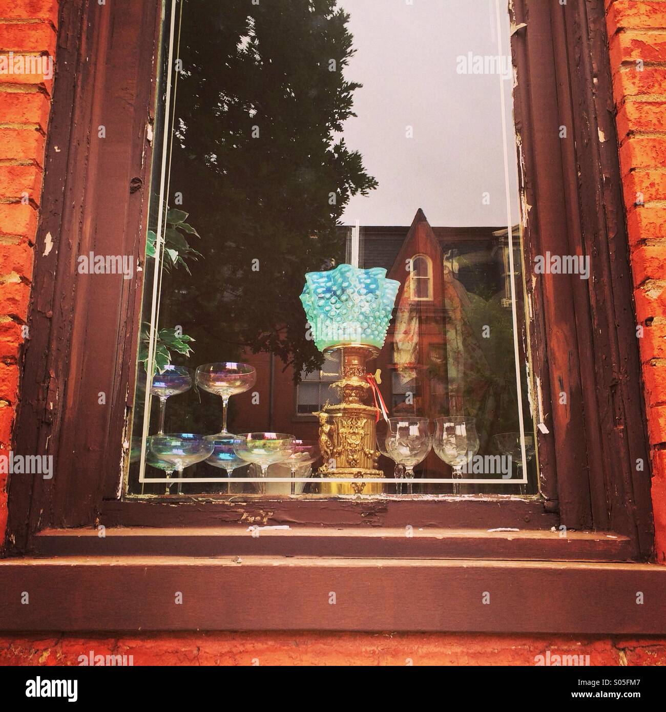 Antique store window Stock Photo - Alamy