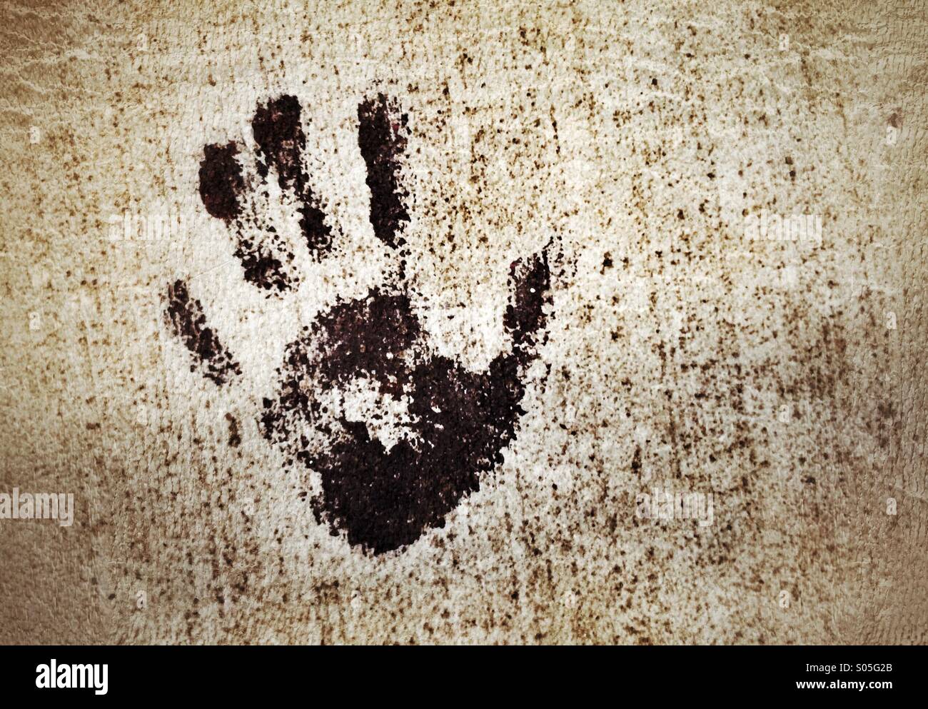 Small hand imprint on the pavement Stock Photo - Alamy