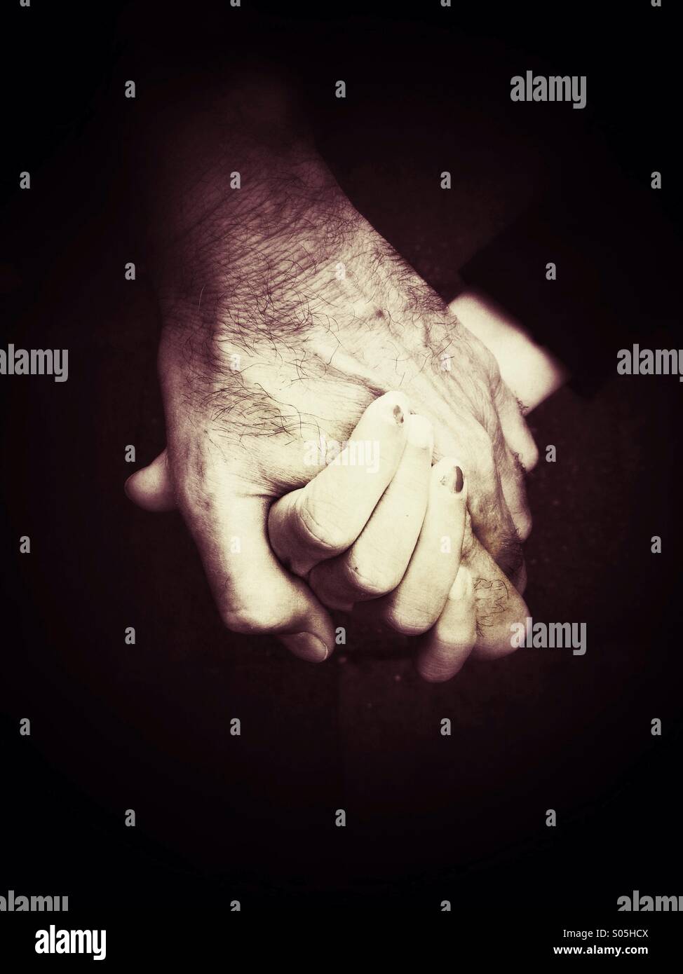 Parent and child holding hands Stock Photo - Alamy