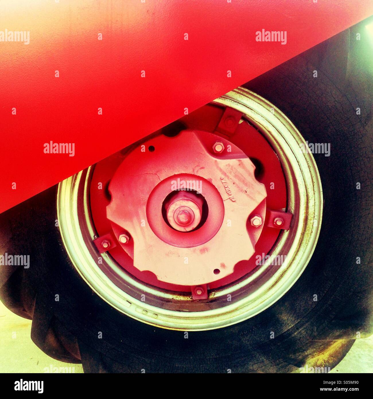 An old tractor wheel Stock Photo - Alamy
