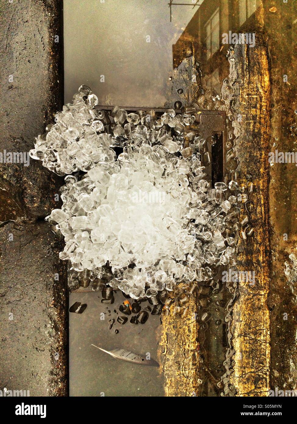 Ice melting on pavement road smartphone stock photos and images - Alamy