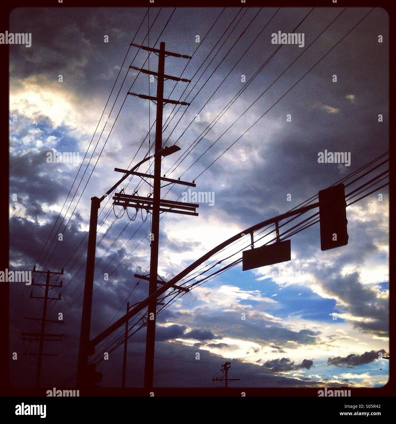 Cloudy City Street Stock Photo - Alamy