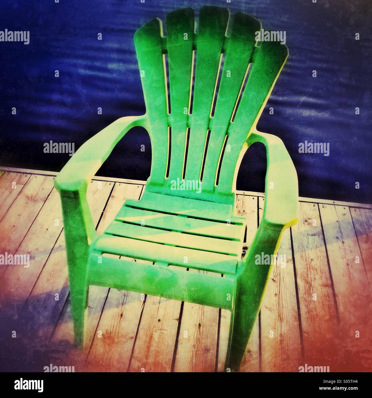 Vintage green chair hi-res stock photography and images - Alamy