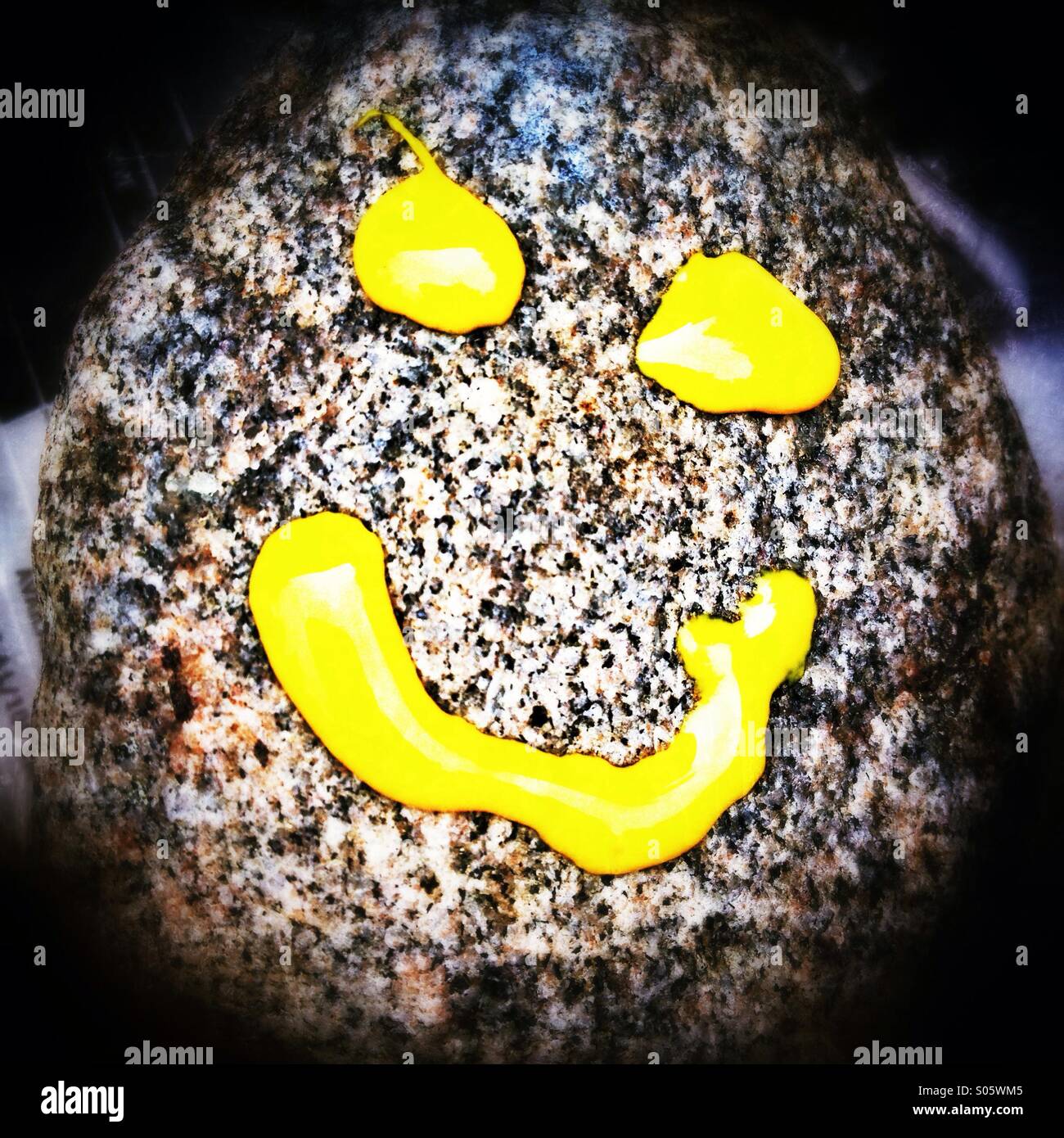 Stone with smiley face hi-res stock photography and images - Alamy