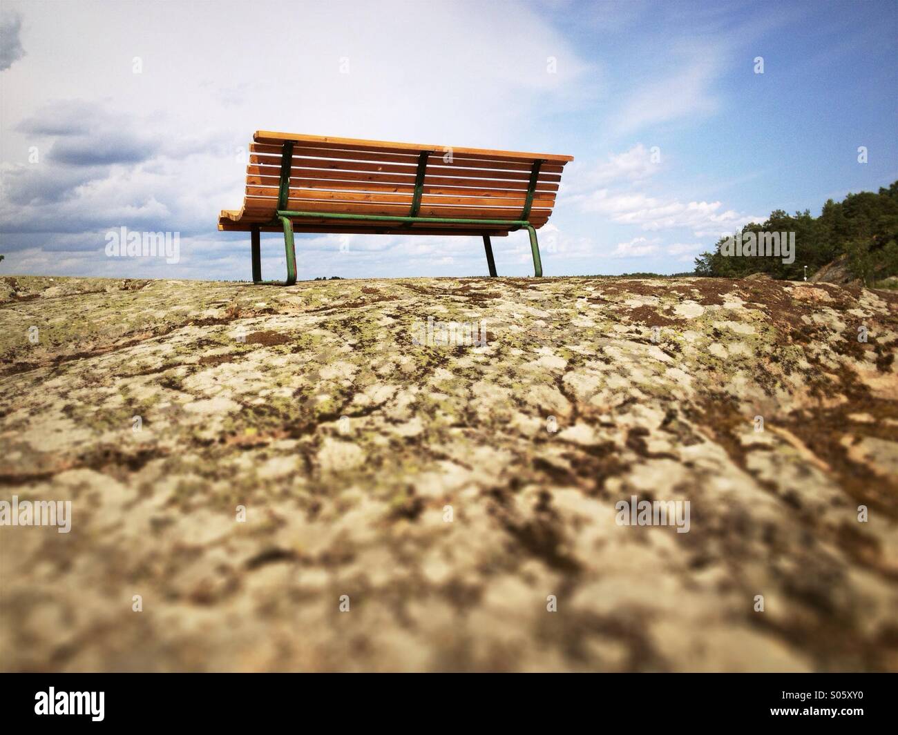 Bench on rocks hi-res stock photography and images - Alamy