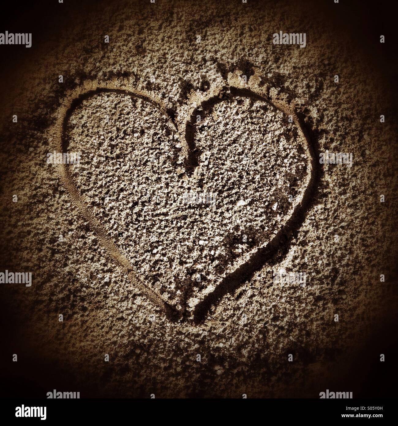 Drawn heart shape on sand hi-res stock photography and images - Alamy