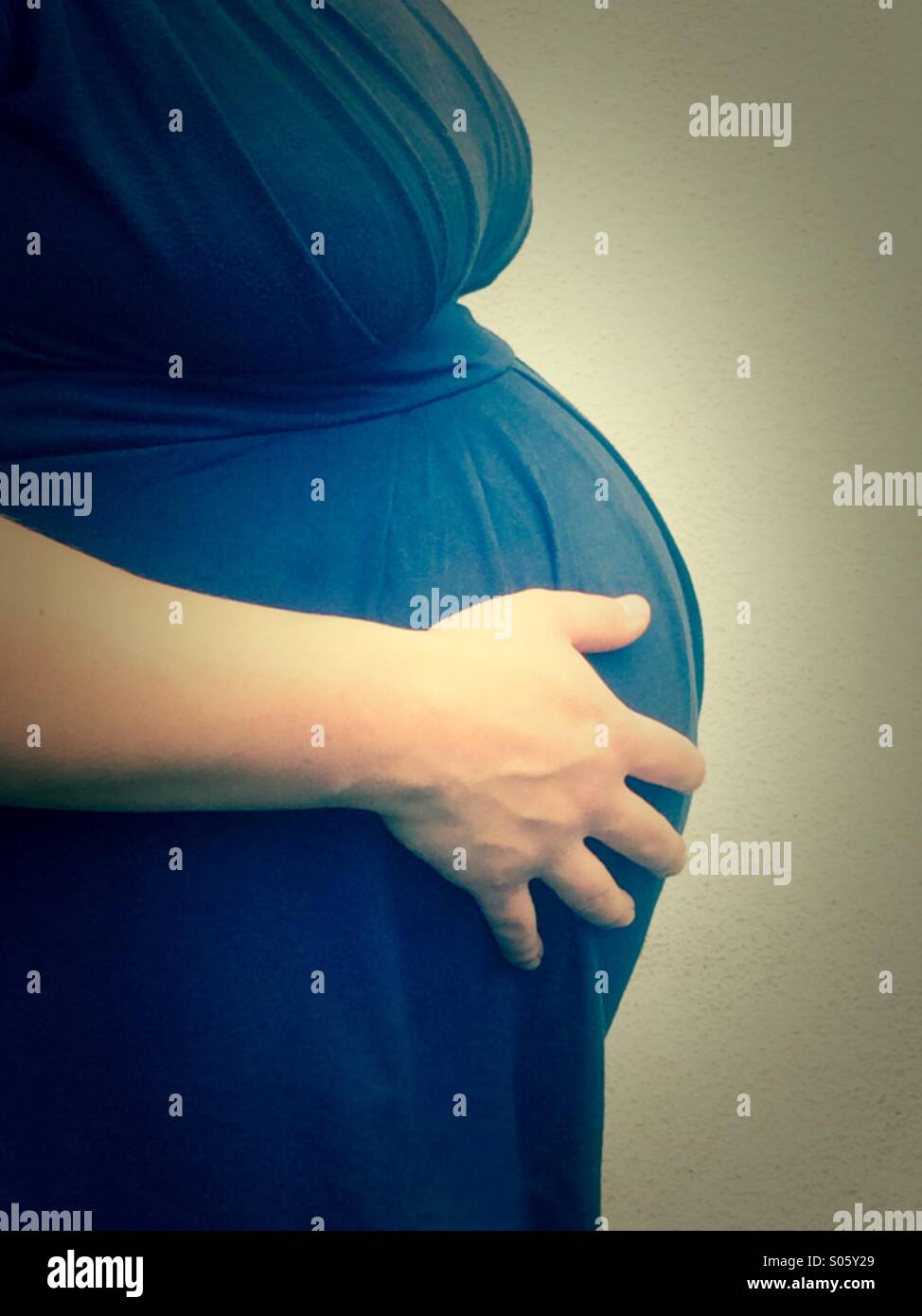 Pregnant bump full term hi-res stock photography and images - Alamy
