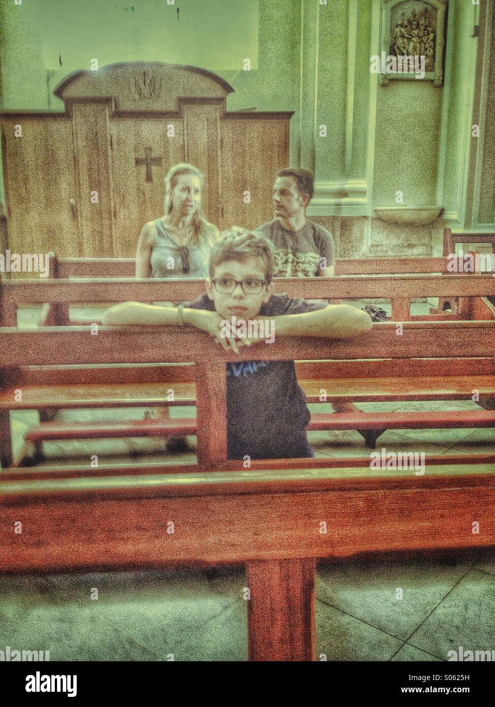 Boy bored church hi-res stock photography and images - Alamy