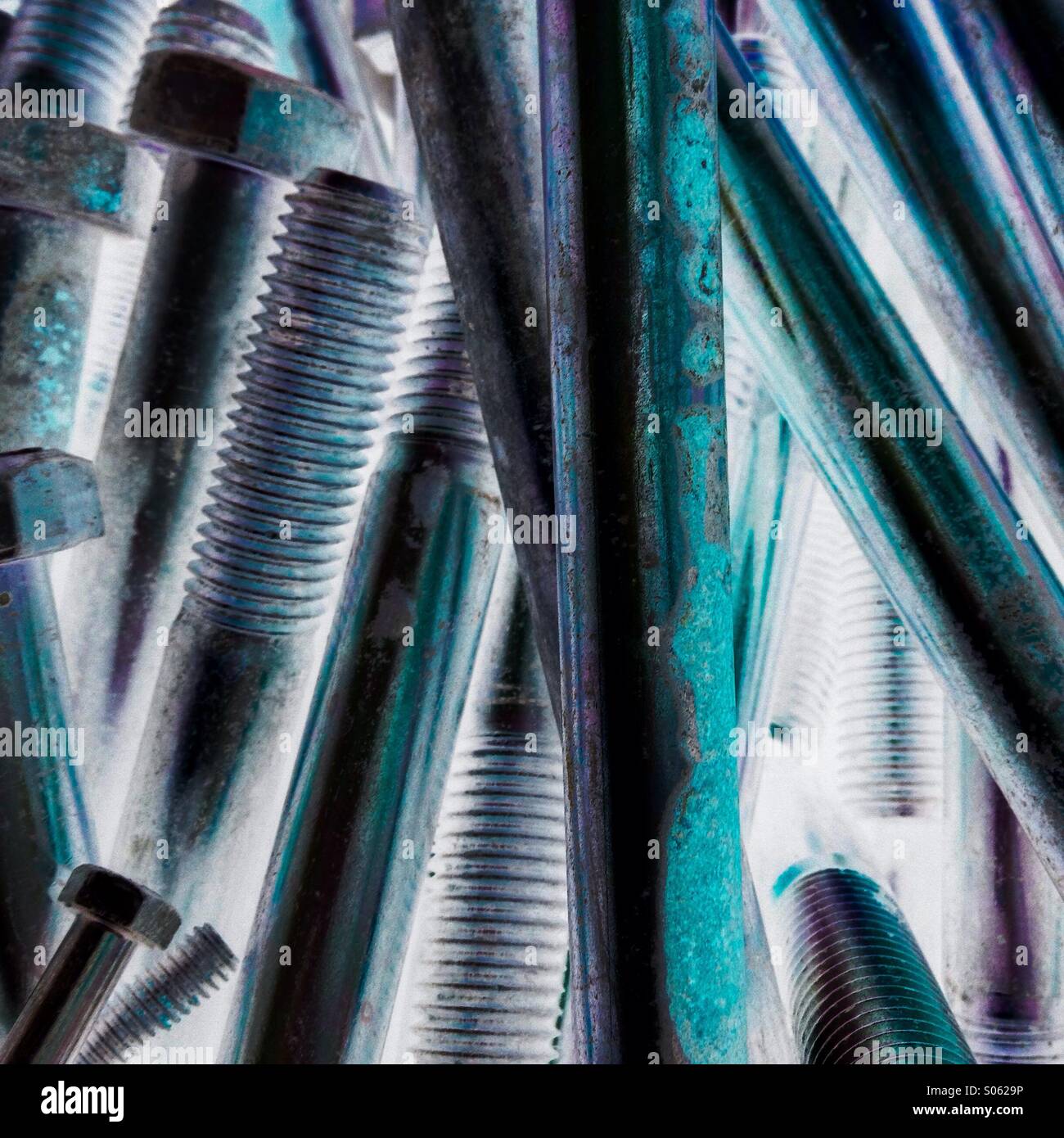 Surplus metal bolts in a box Stock Photo - Alamy