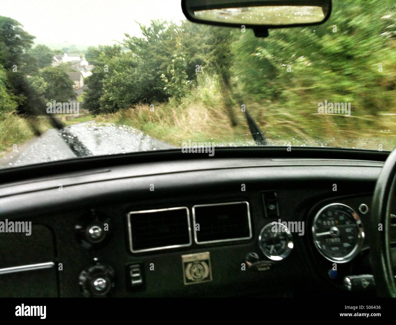Classic car B road Britain Stock Photo - Alamy
