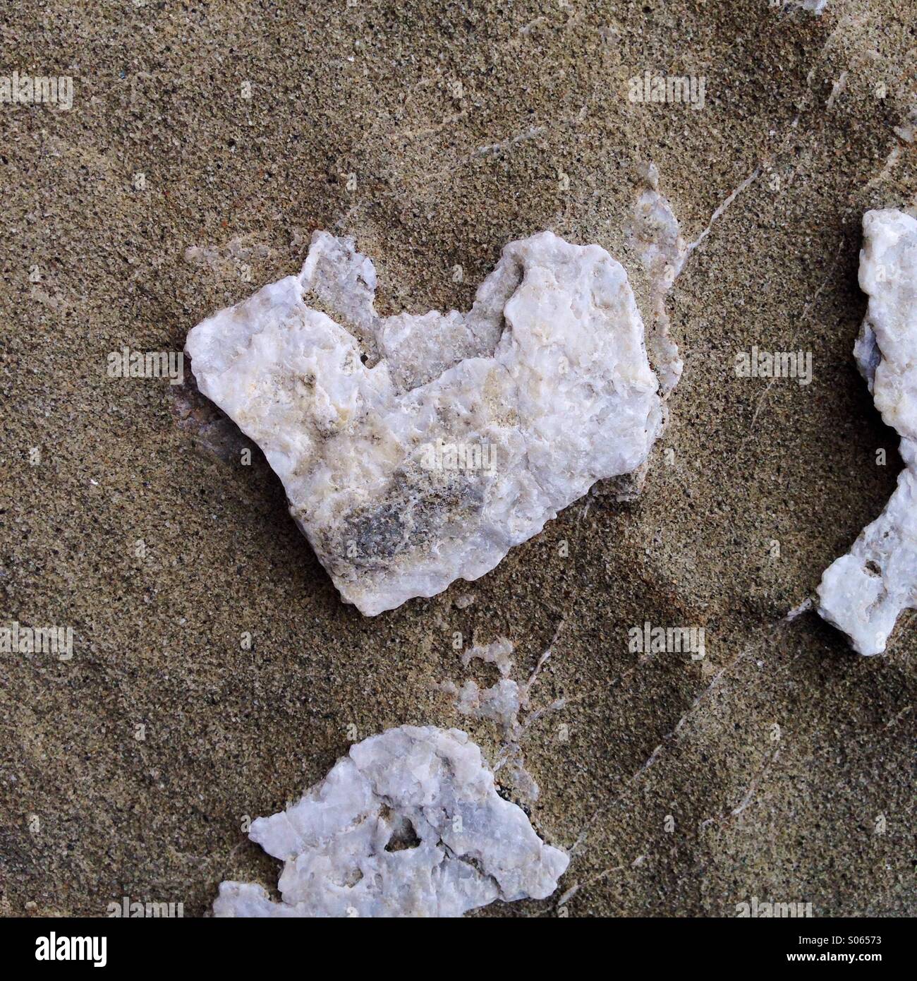 Heart rock sand 2 Stock Photo - Alamy