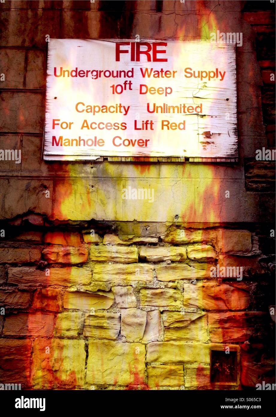 Close up of a fire safety sign with flames Stock Photo - Alamy