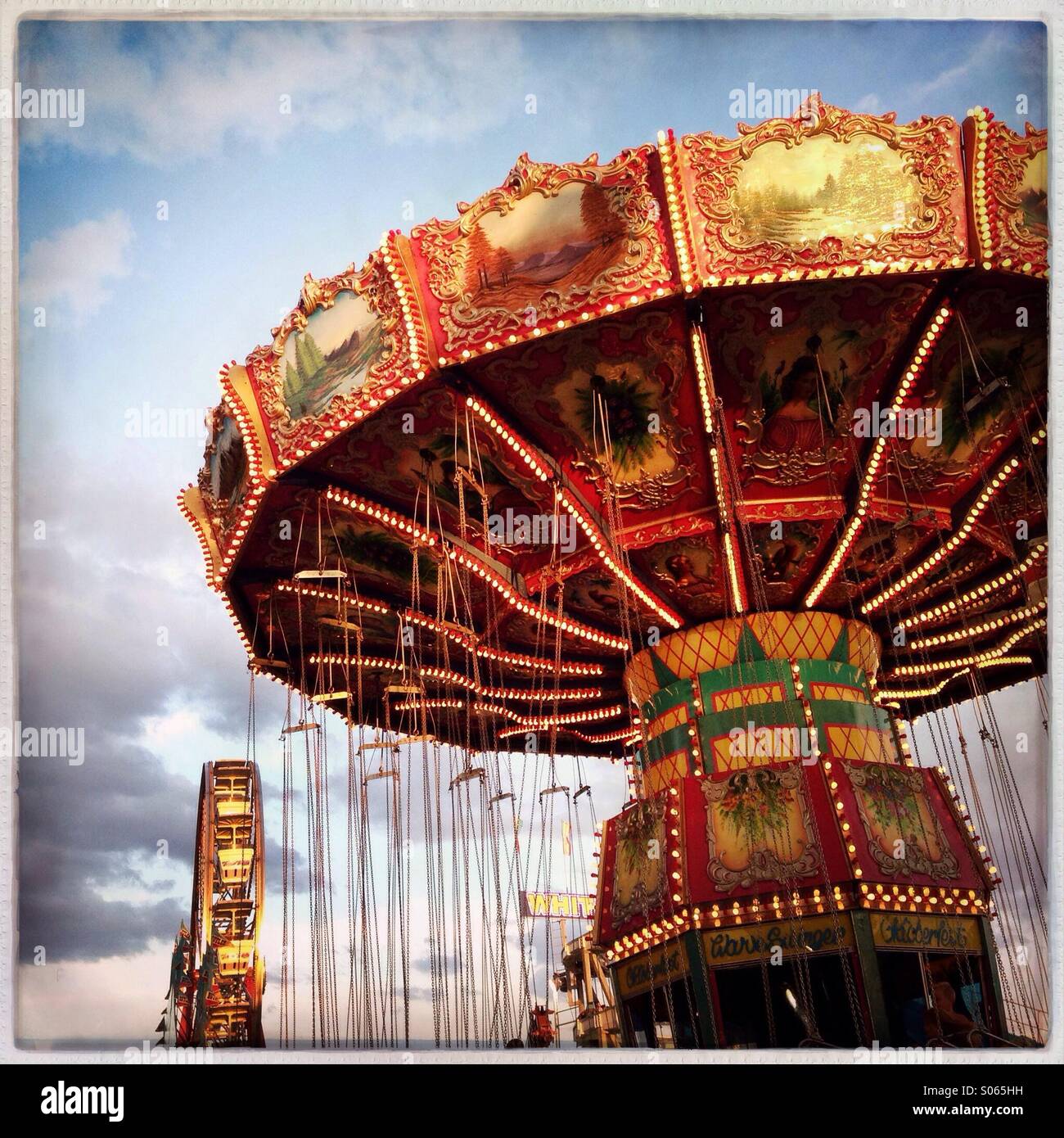 Summer carnival swing hi-res stock photography and images - Alamy