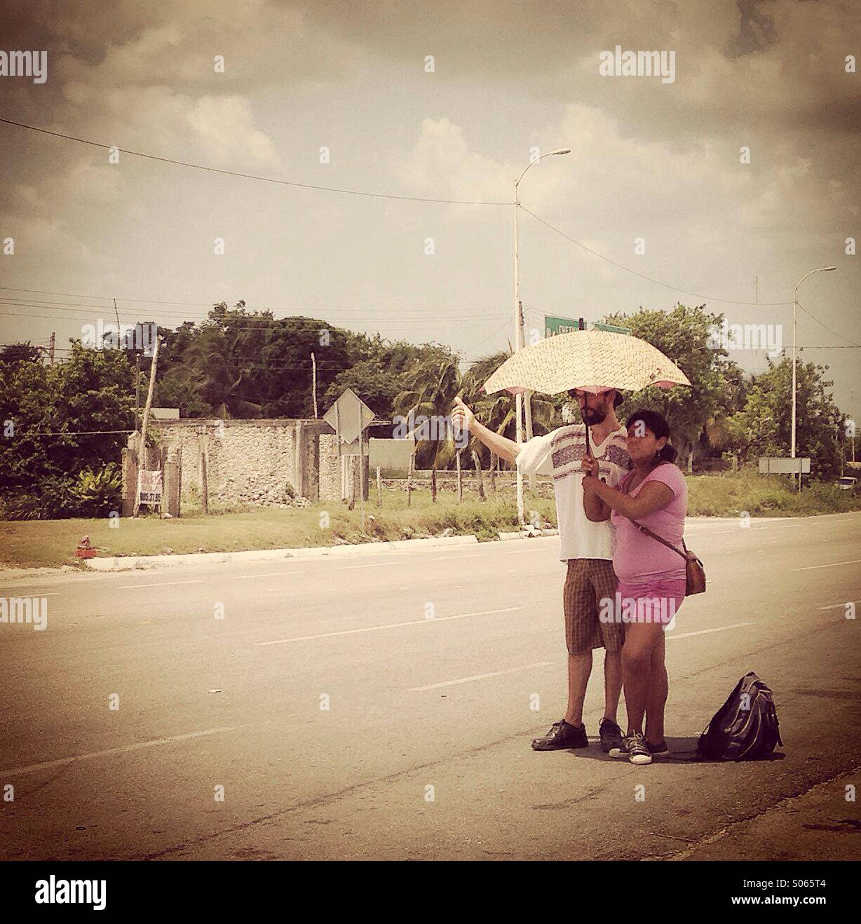 Two people under umbrella hi-res stock photography and images - Alamy