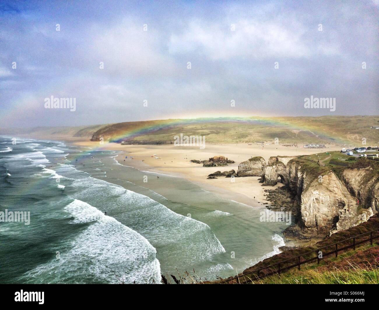 Rainbow over Perranporth beach, Cornwall Stock Photo - Alamy