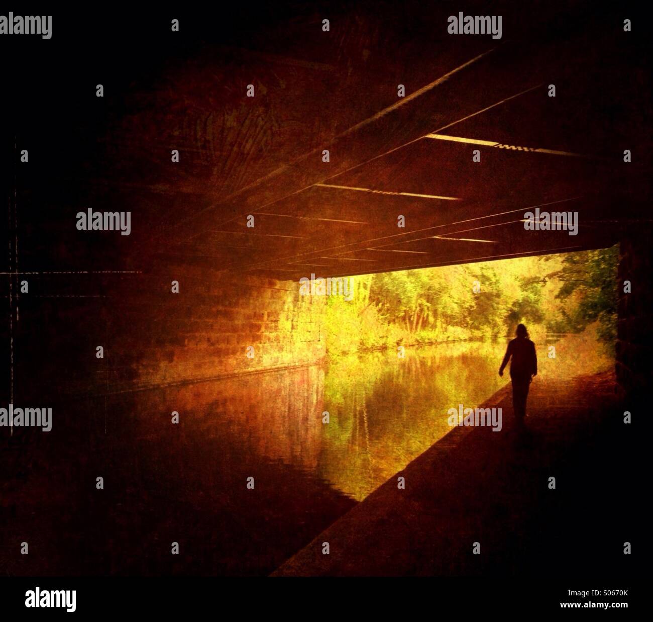 Silhouette woman walking under bridge hi-res stock photography and ...