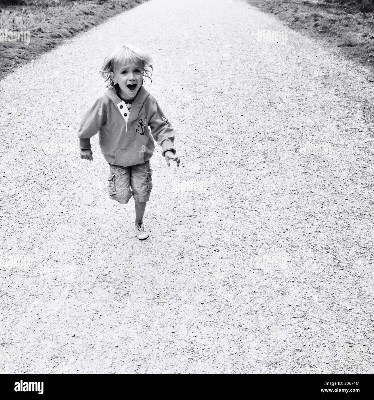 Child running towards you, screaming Stock Photo - Alamy