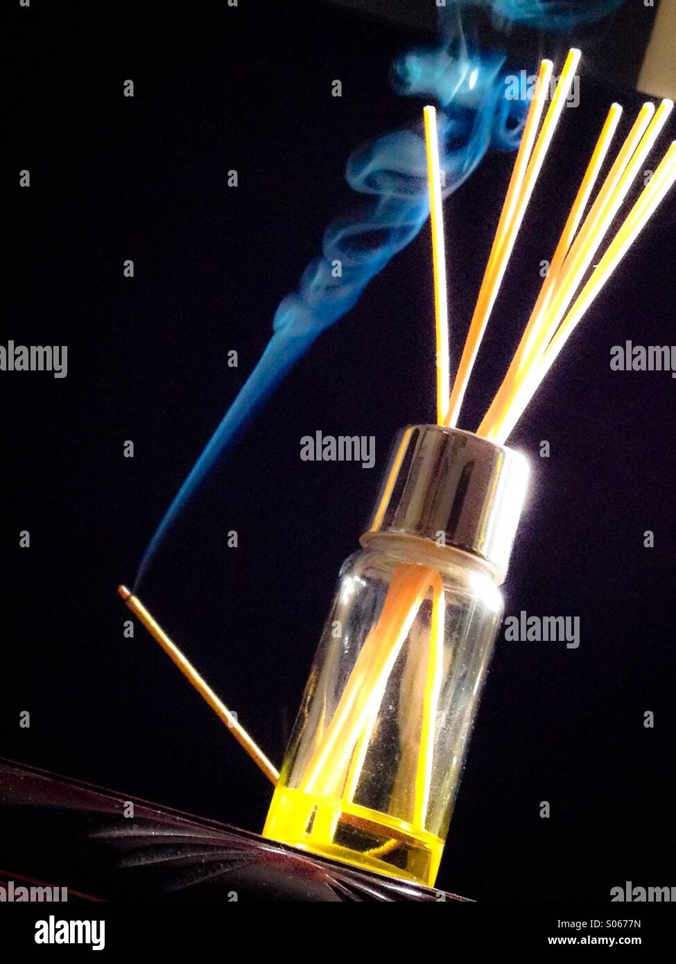 Burning joss sticks hi-res stock photography and images - Alamy