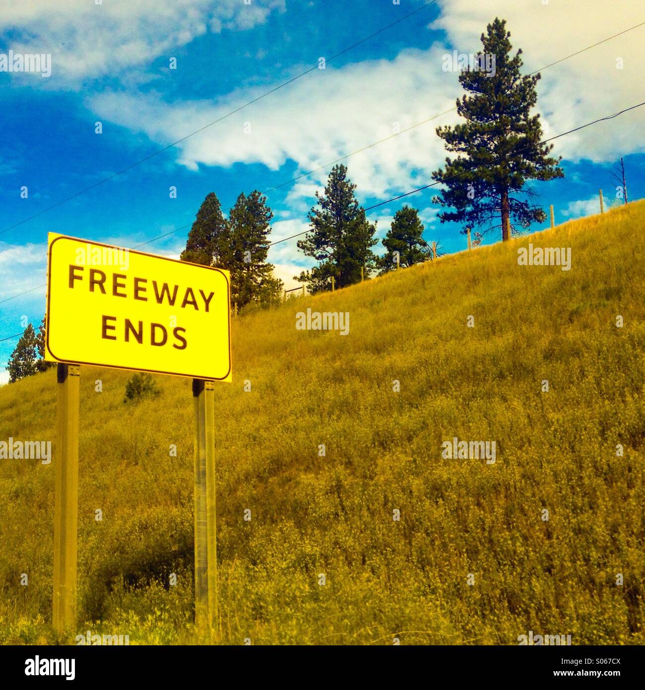 "Freeway Ends" road sign under late summer blue sky Stock Photo - Alamy