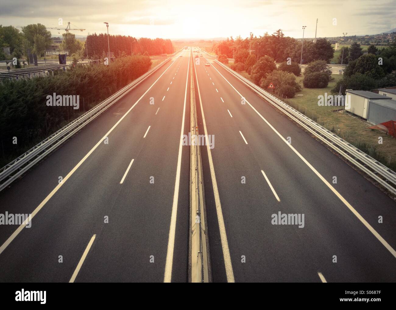 Highway at sunset hi-res stock photography and images - Alamy