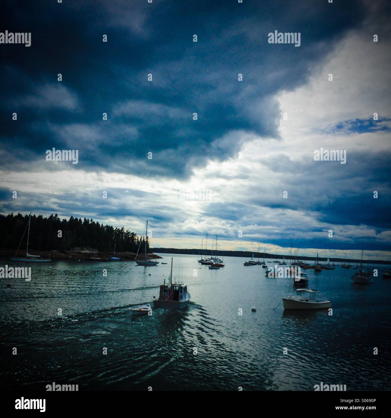 Motor boat heading out of harbor Stock Photo - Alamy Motor boat heading out of harbor Stock Photo - Alamy