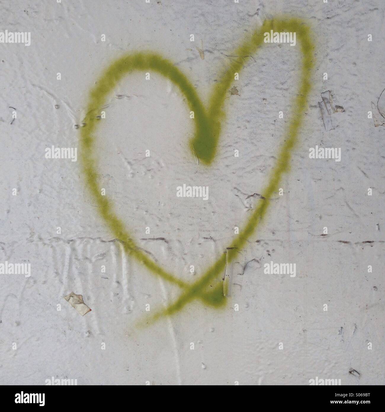Green love heart street art, painting in Mexico City Stock Photo - Alamy