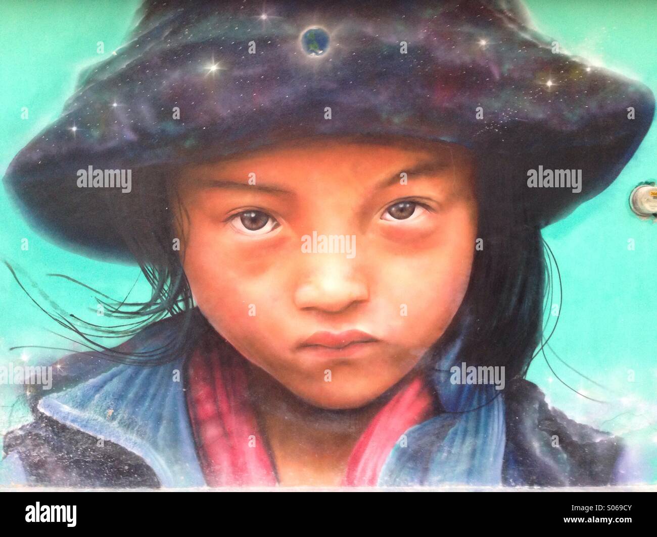 Mexican boy with hat and long hair, street painting, Holbox, Mexico ...