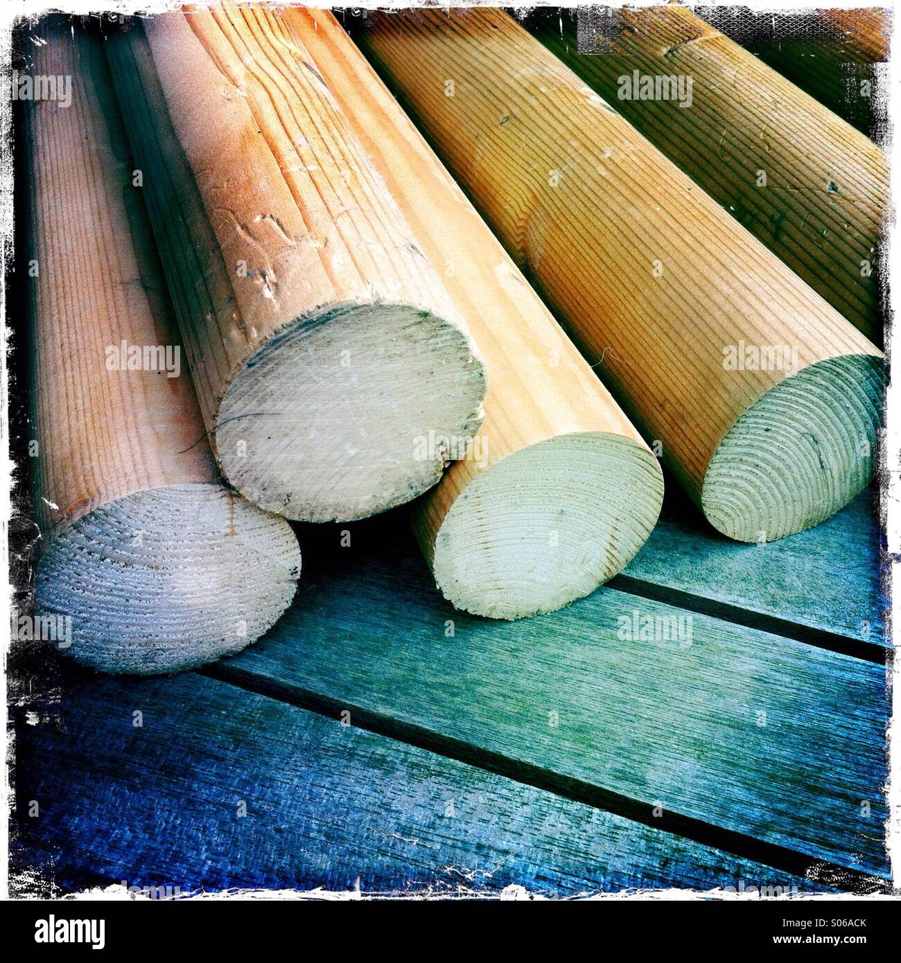 Round timber on woodden table Stock Photo - Alamy