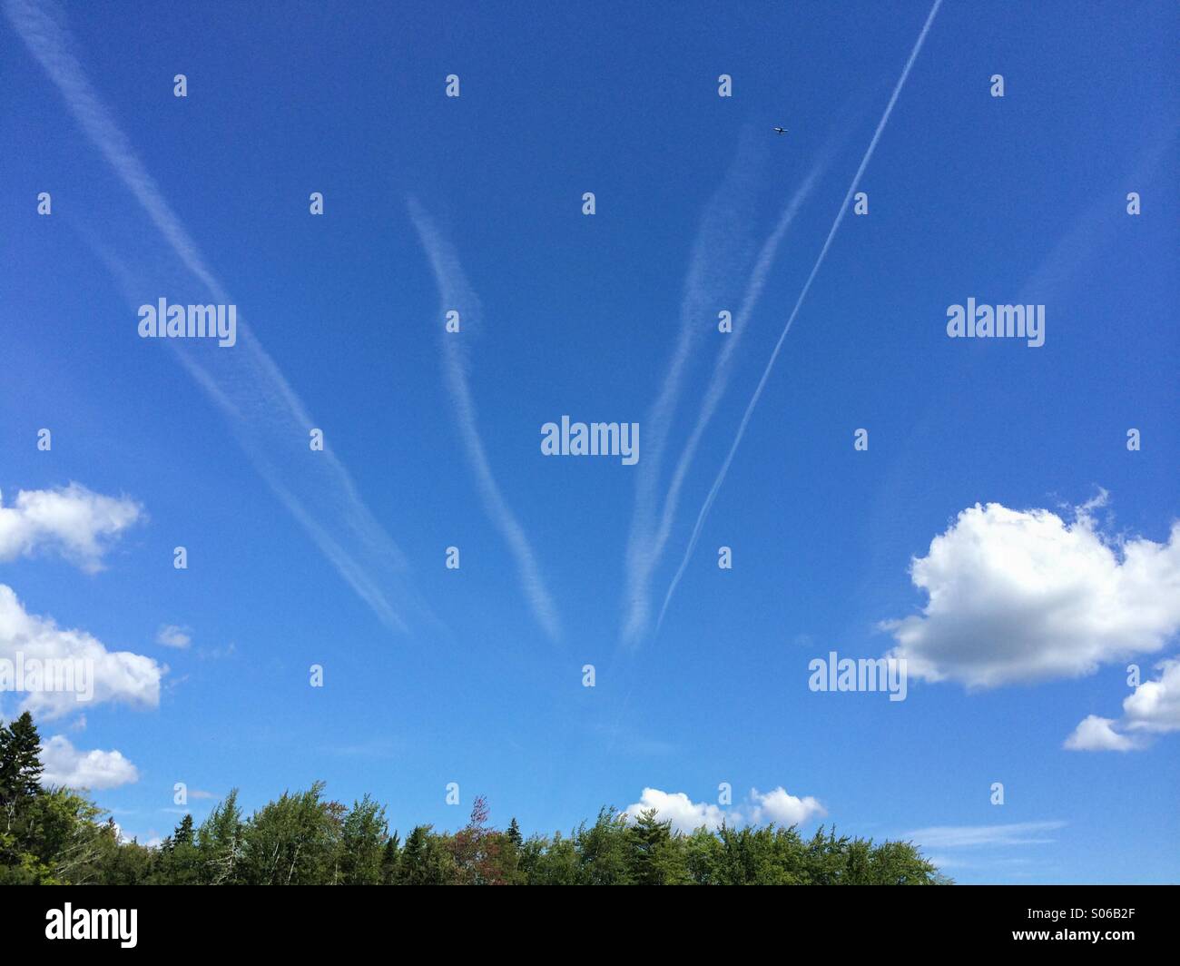 Contrails in sky Stock Photo - Alamy