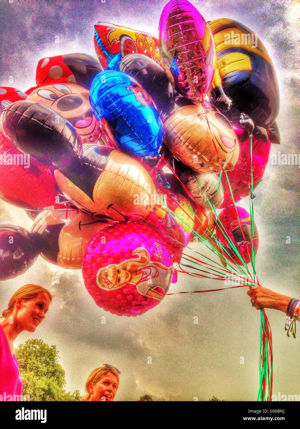 Women with balloons hi-res stock photography and images - Alamy