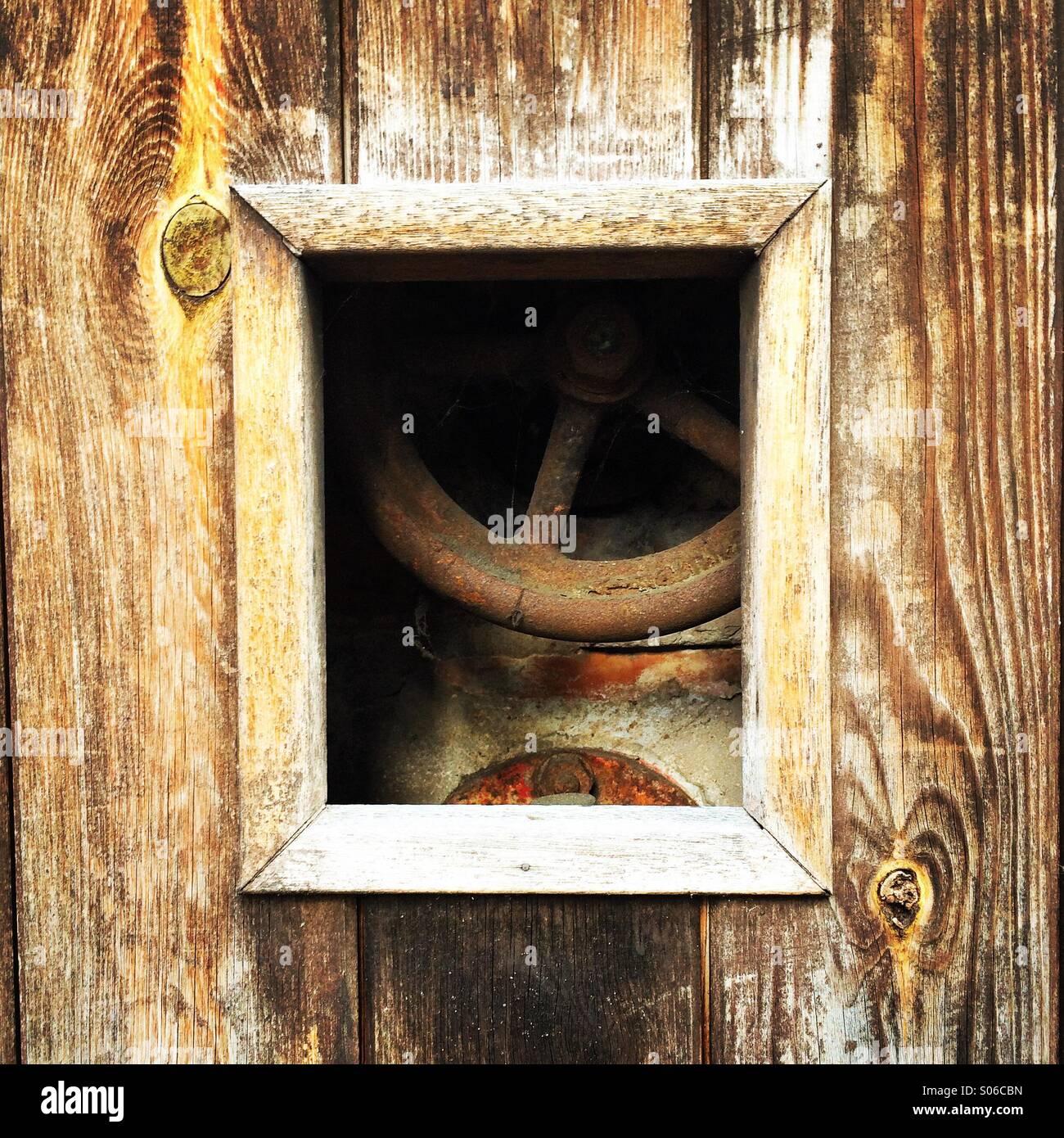 Wooden framed window into a storage room Stock Photo - Alamy